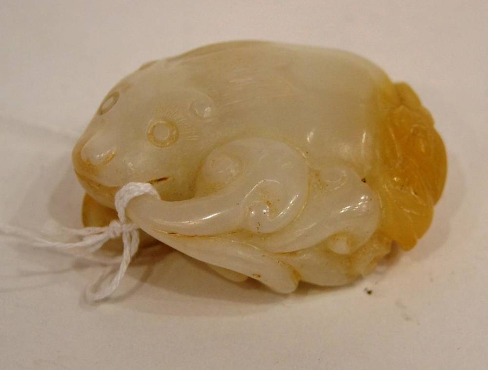 Lot 397 - A Chinese Carved Jade Figure of a Rat,