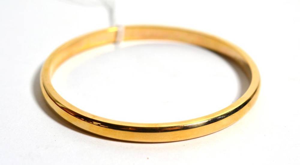 Lot 75 - A 9 carat gold bangle, 36.2g