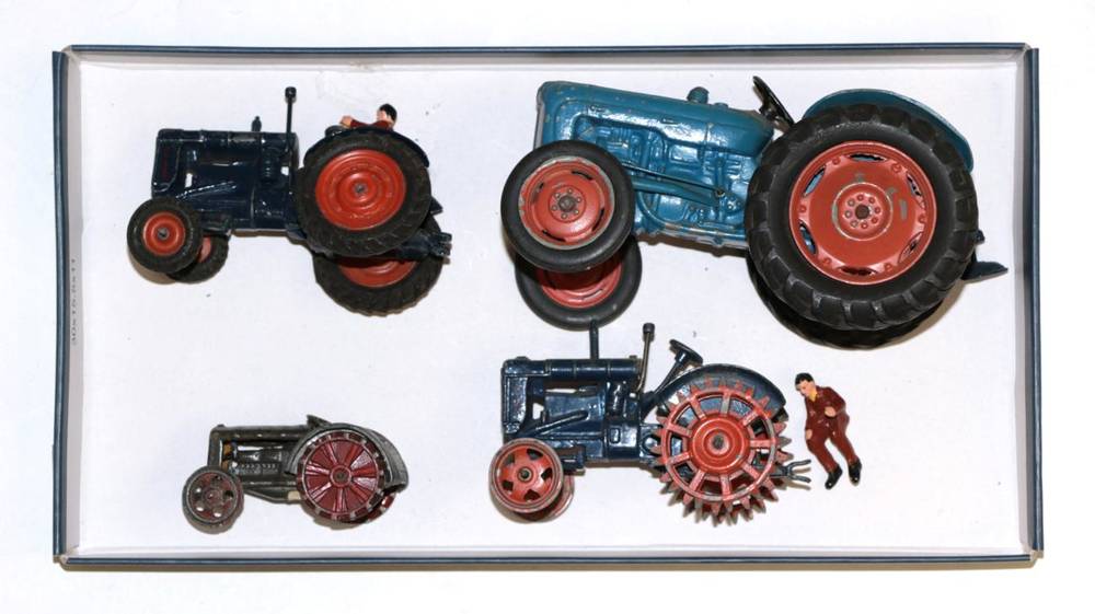 Lot 496 - Tractors Four Unboxed Examples Britains spud-