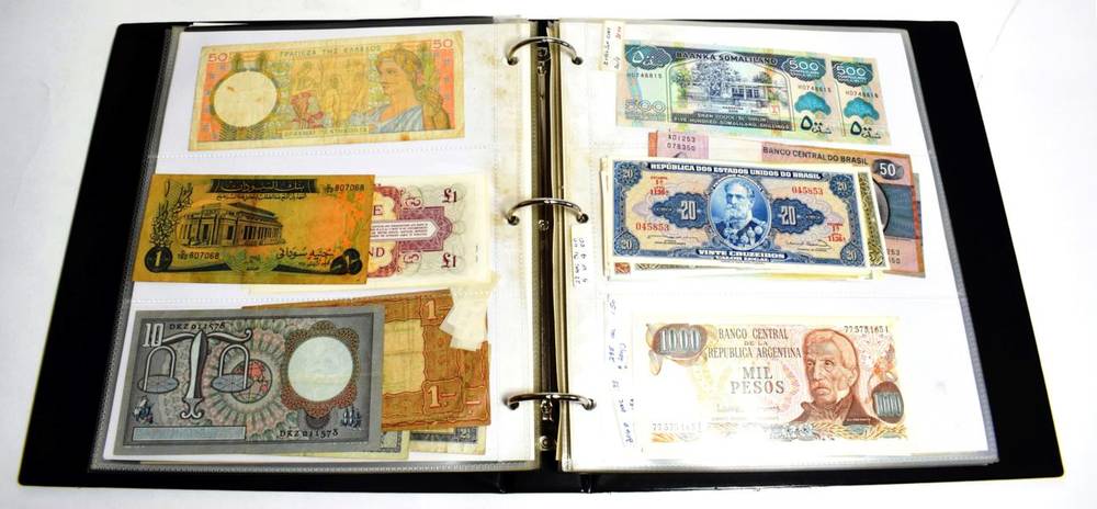 Lot 206 - An album of World banknotes including notes