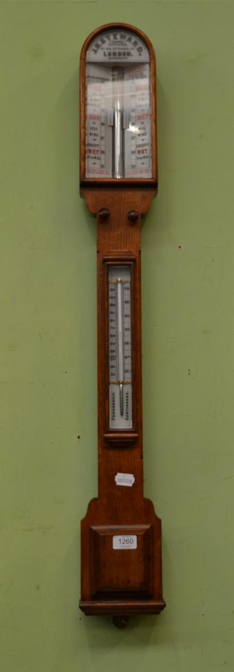 Lot 1260 - A Victorian oak stick barometer, the twin