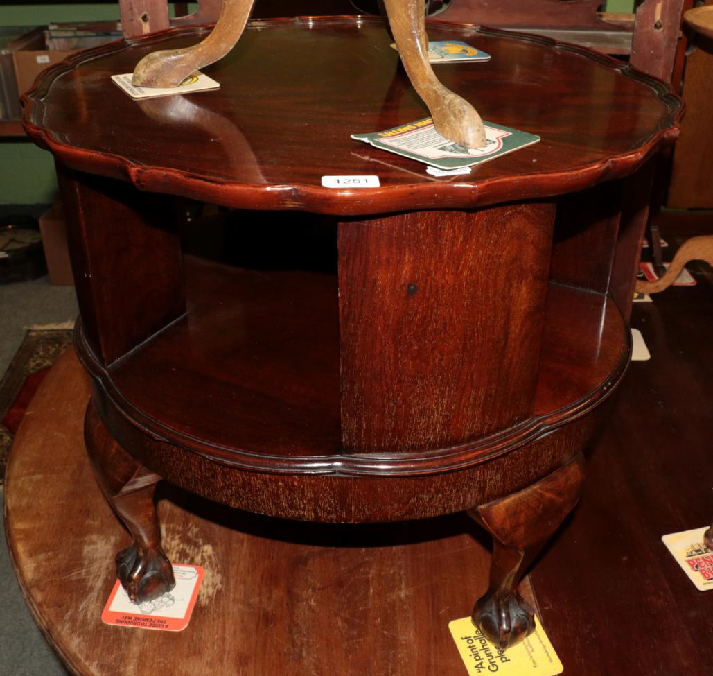 Lot 1251 - A 1920/30s round two-tier table on ball and