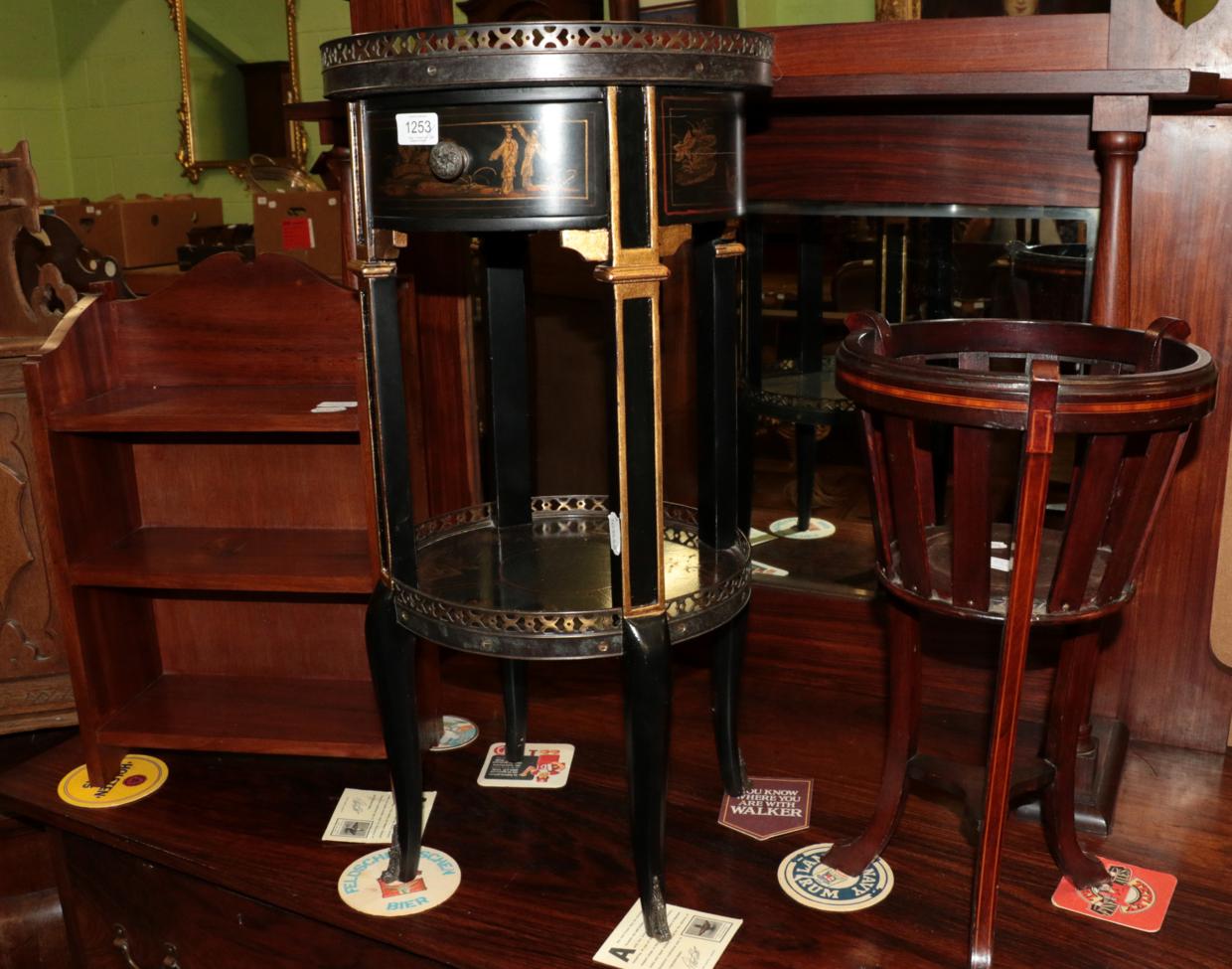 Lot 1253 - A two-tier circular Japanned table, a small