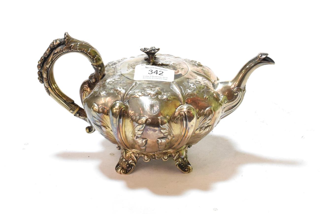 Lot 342 - A Victorian silver teapot, the body by