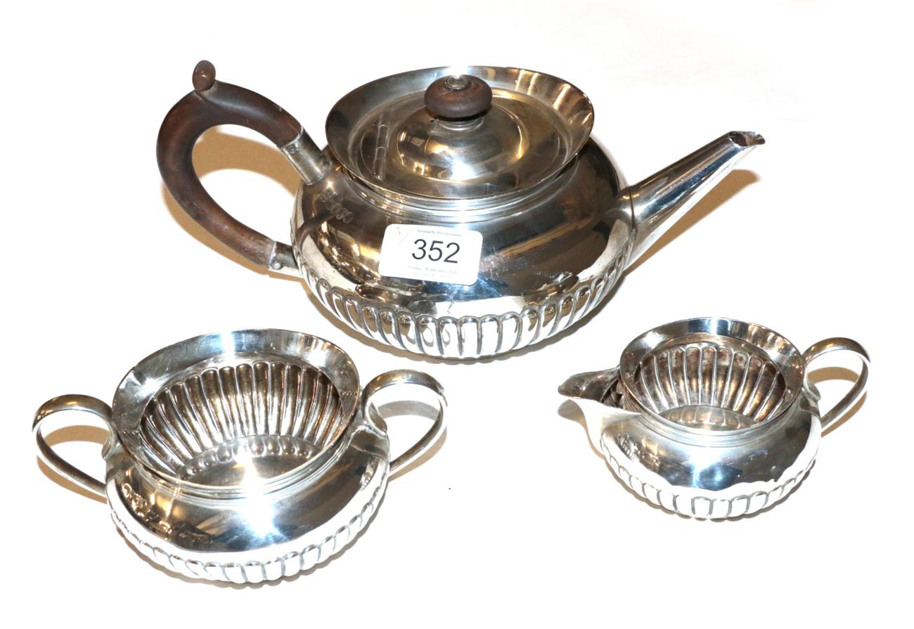 Lot 352 - A three-piece Victorian silver tea-service,