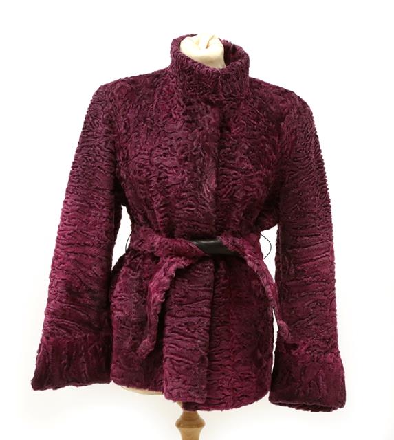 Lot 2103 - A Saga Purple Astrakhan Wool Jacket, also