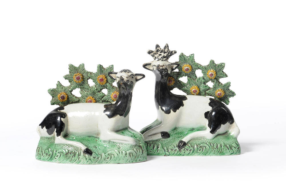 Lot 111 - A Pair of Staffordshire Pottery Figures of a