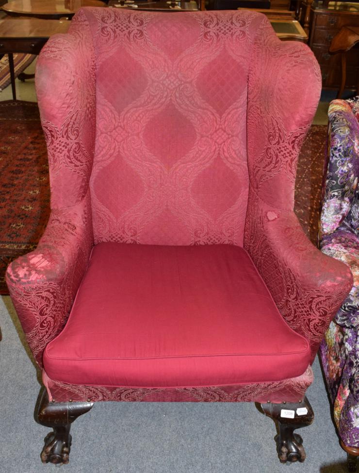 Lot 1208 - A Victorian wingback chair covered in red