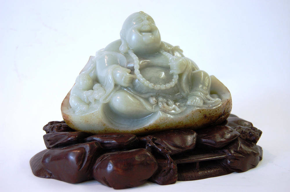 Lot 246 - A Chinese Jade-type Figure of a Pu-tai, the