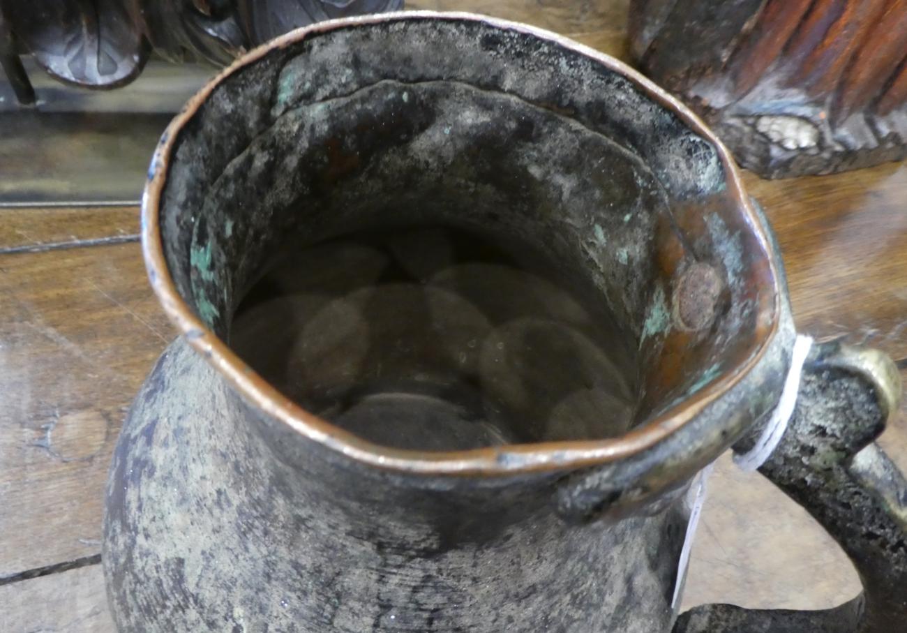 Lot 204 - A Medieval Copper and Brass Jug, probably