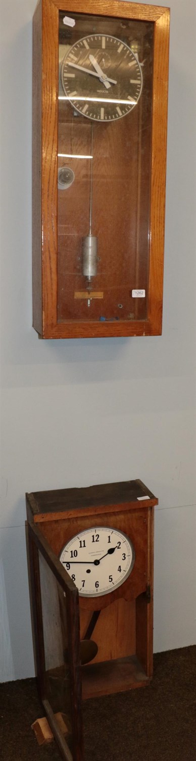 Lot 1262 - A 1950's Inducta pendulum wall clock,