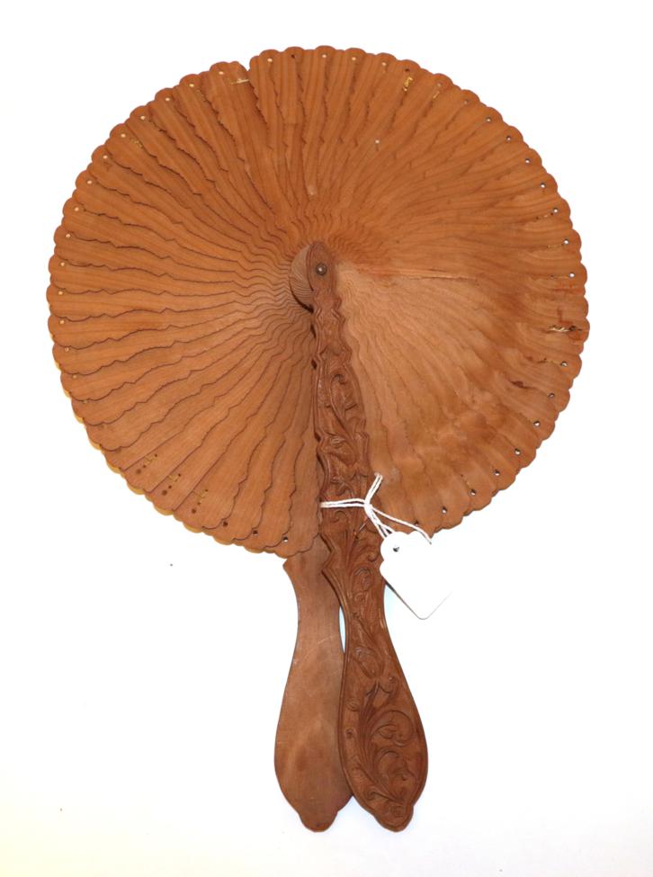 Lot 4036 - A Wood Cockade Fan with elaborately carved