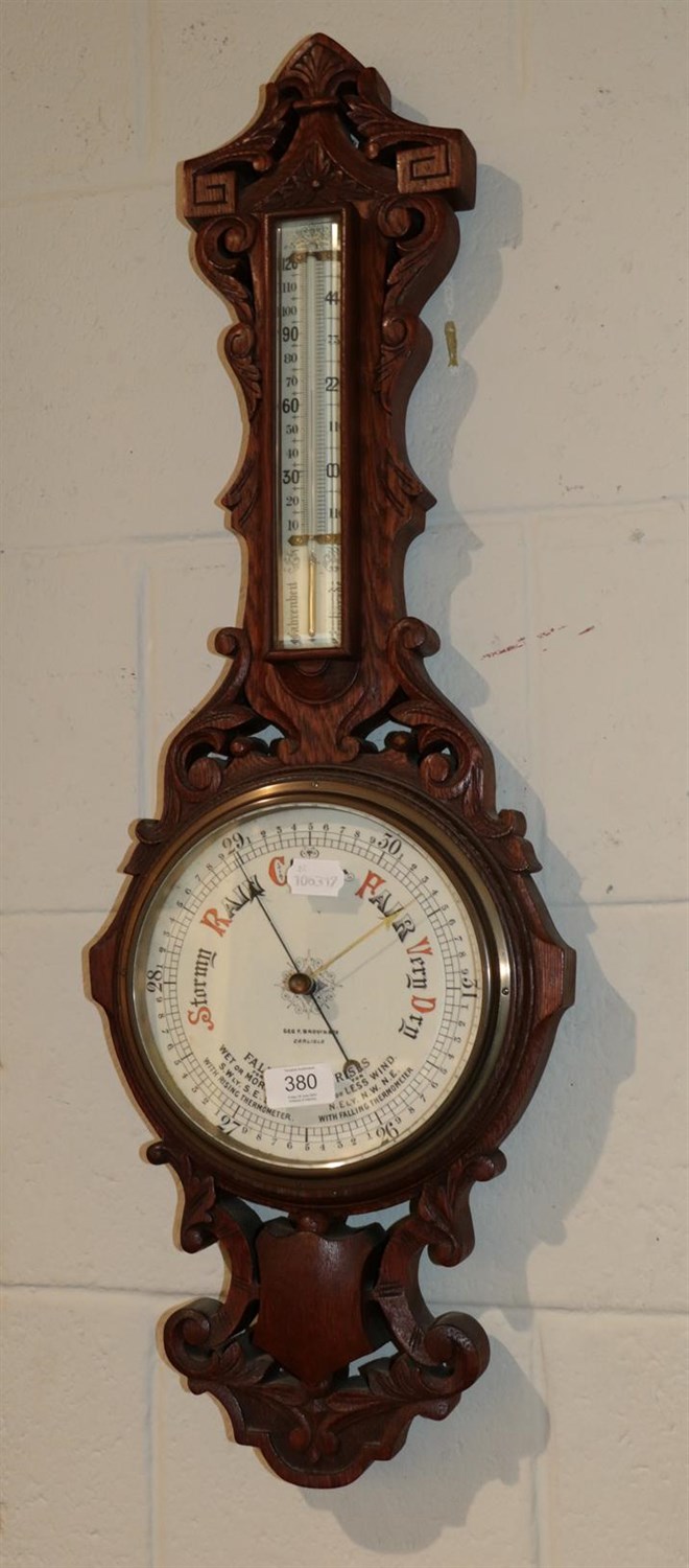 Lot 380 - A late Victorian carved oak aneroid