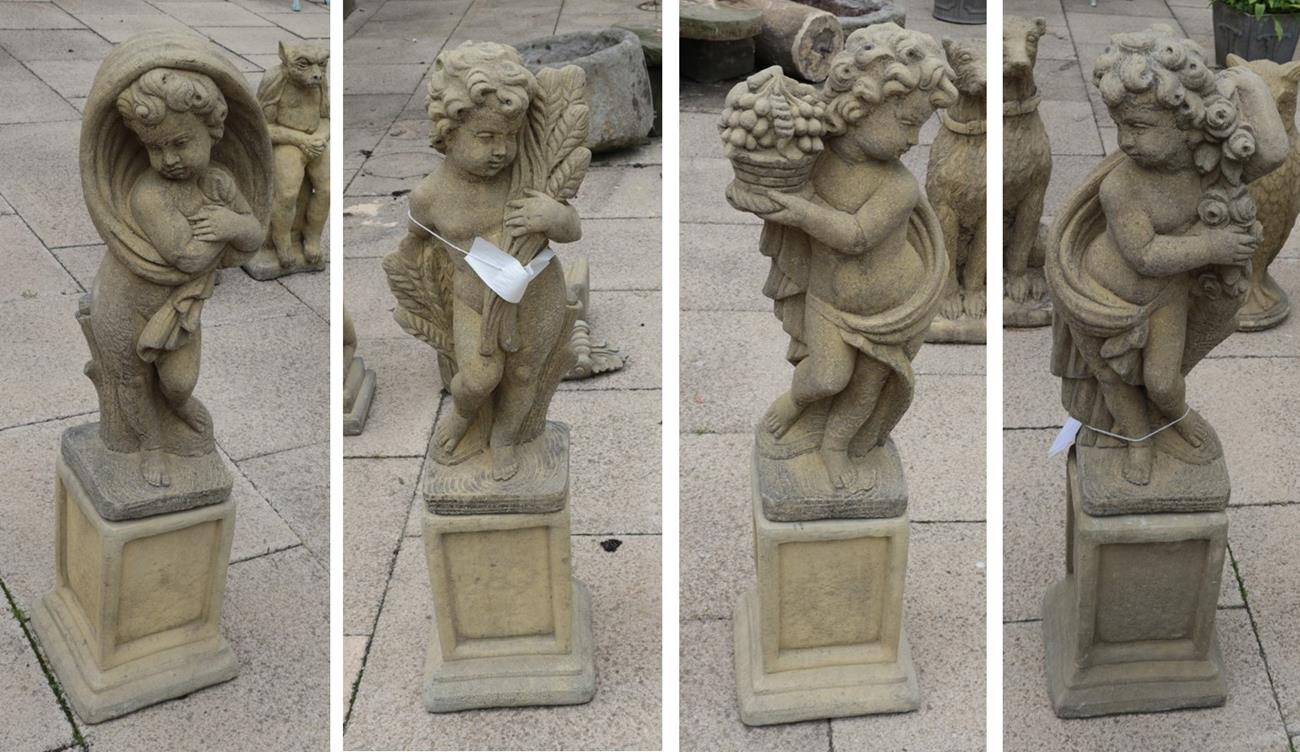 Lot 1124 - Four composition statues of the four