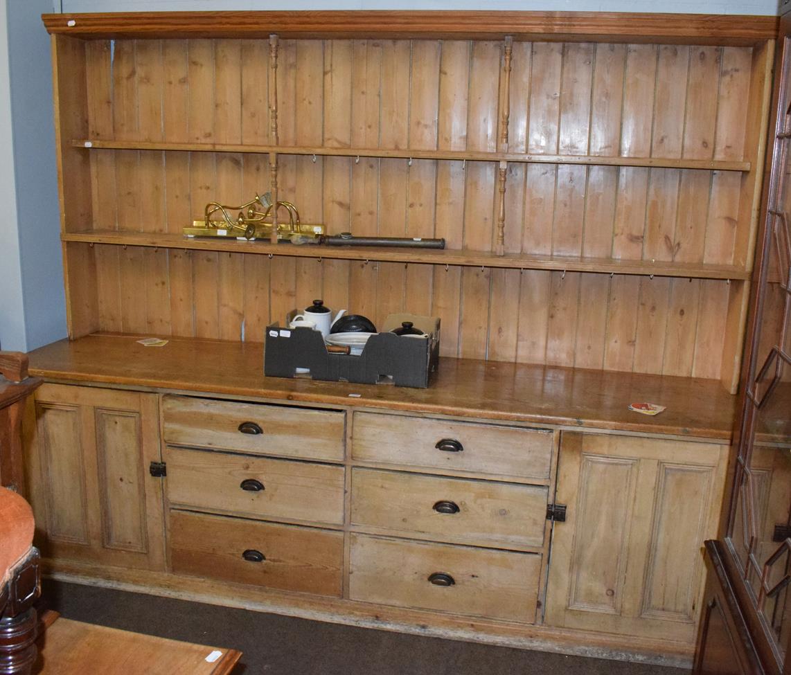 Lot 1238 - An impressive pine dresser, composed of
