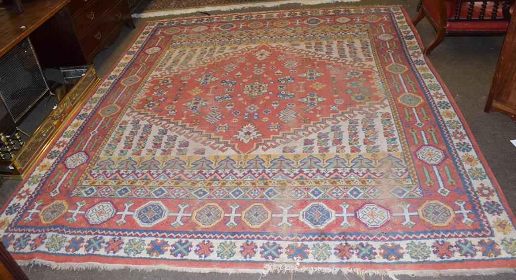 Lot 1327 - An Indian carpet of unusual size, the
