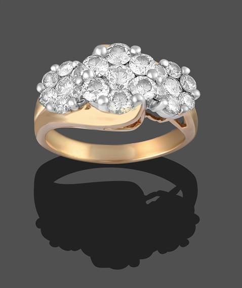 Lot 2288 - A Diamond Triple Cluster Ring, three