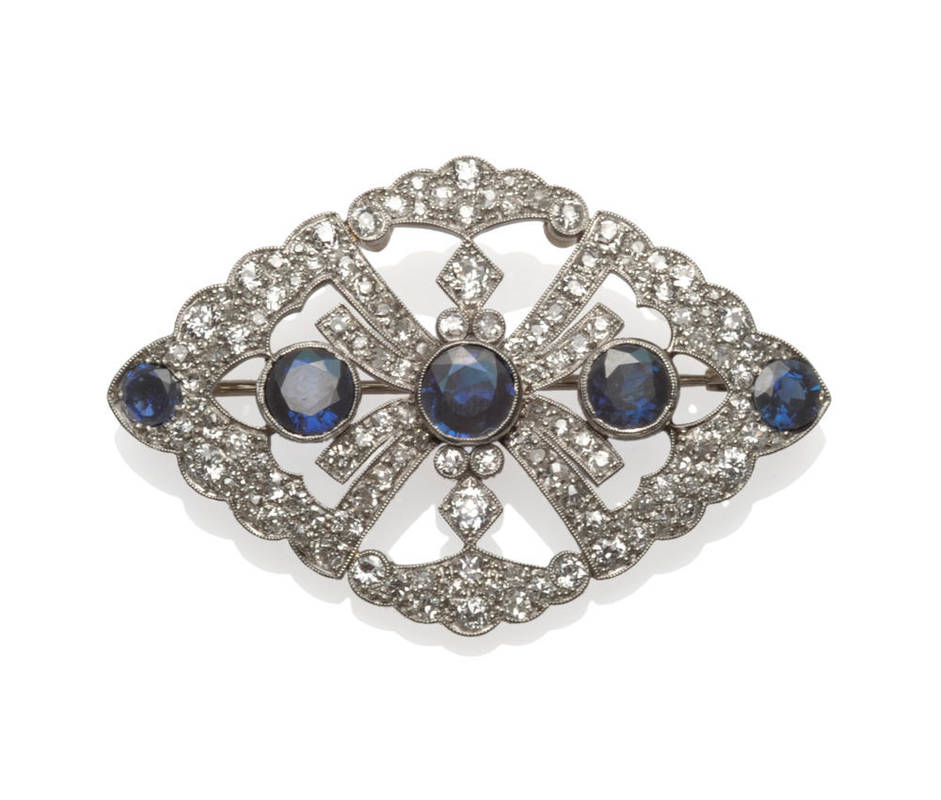 Lot 658 - A Sapphire and Diamond Brooch, the lozenge