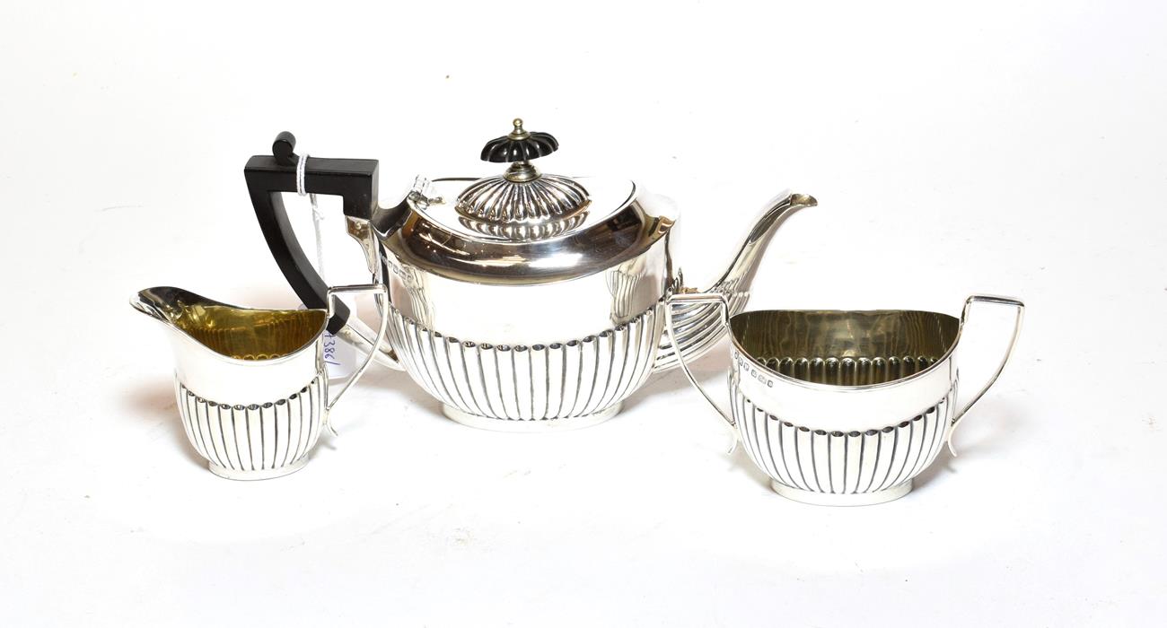 Lot 346 - A three-piece Victorian silver tea service,