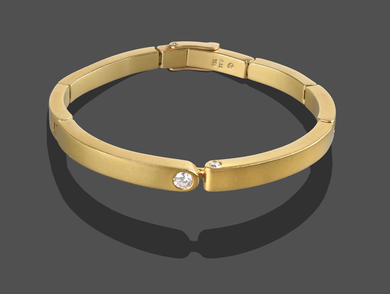 Lot 2269 - A Bracelet, by Gucci, inset with three