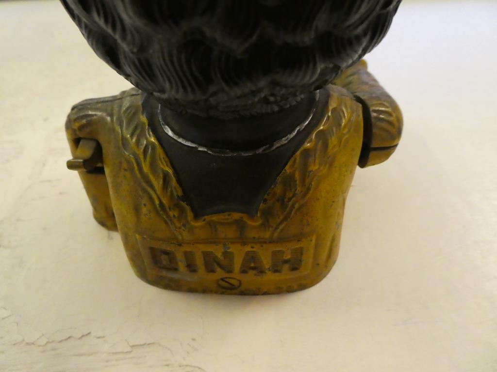 Lot 183 - A Dinah money box, 17cm high