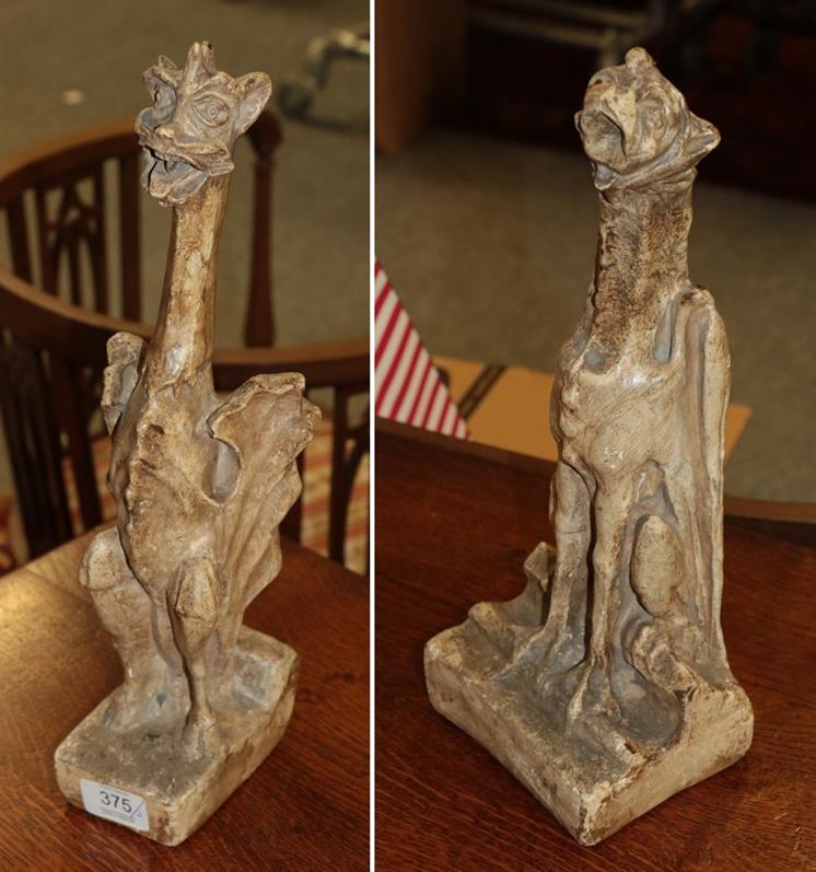 Lot 375 - A pair of plaster figures of grotesque