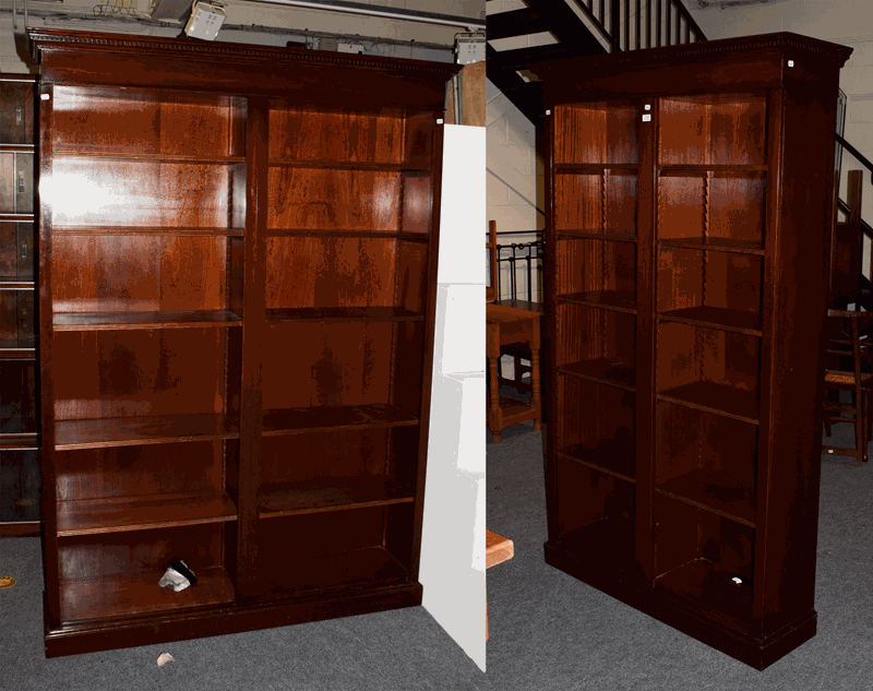 Lot 1384 - Two reproduction mahogany open bookcases