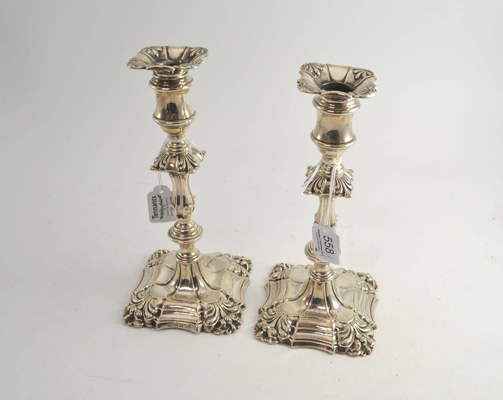 Lot 558 - A Pair of Victorian Silver Candlesticks,