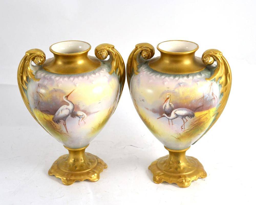 Lot 62 - A pair of Crown Devon pottery vases painted