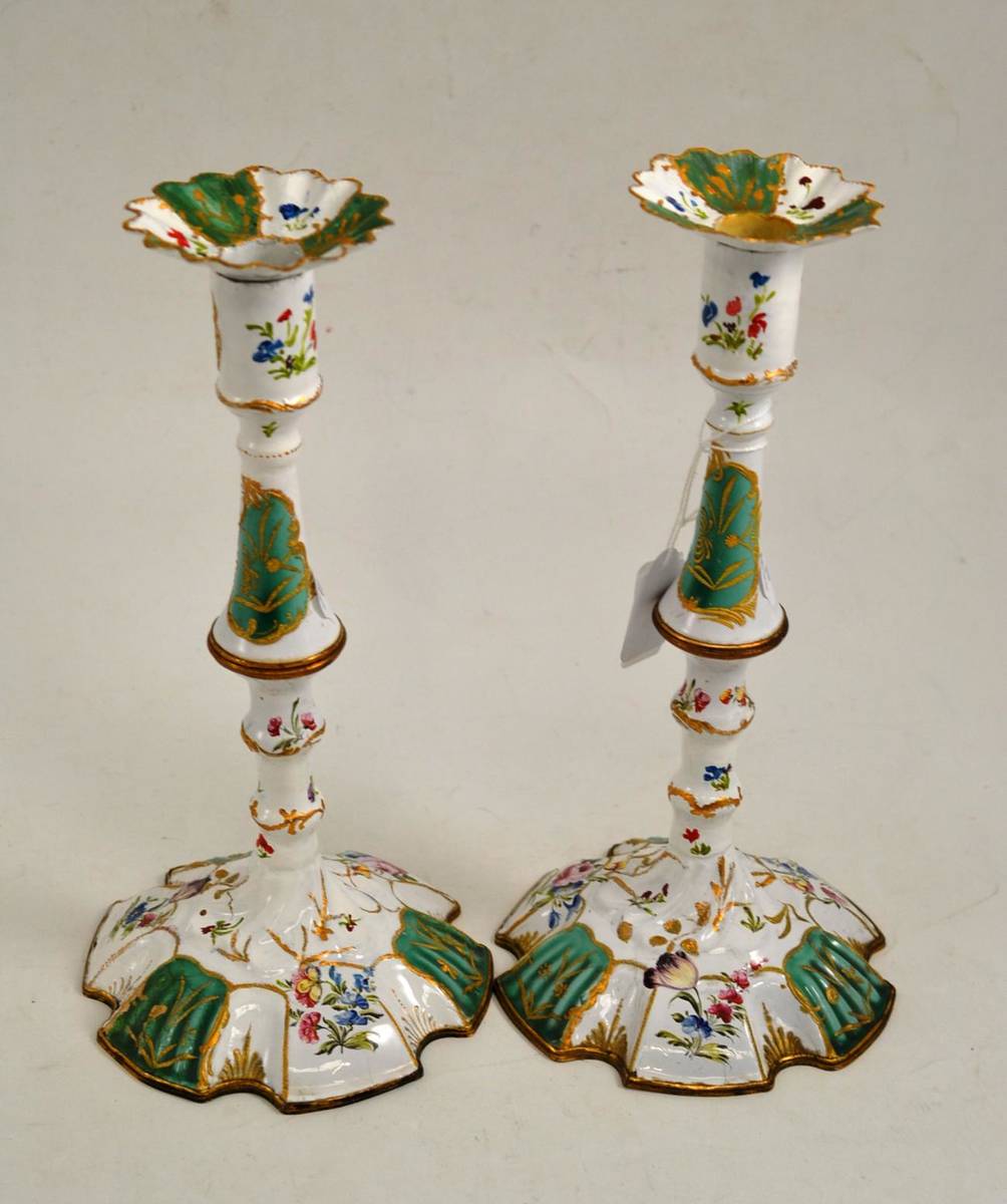 Lot 491 - Pair of enamel candlesticks (restored),